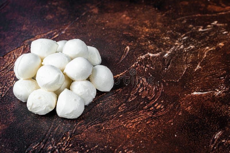 Buffalo Mozzarella Cheese Mini Balls on Kitchen Table. Dark Background ...