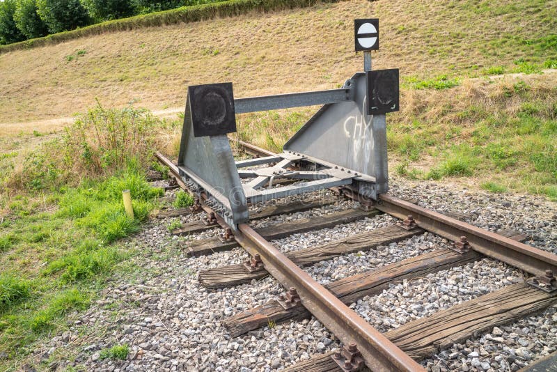 Buffer Stop of a Railroad in the Field Stock Photo - Image of rocky ...