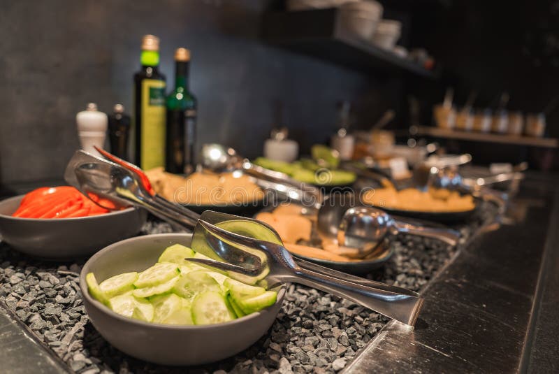 Buffet Display with Fresh Vegetables and Condiments in Luxury Hotel ...