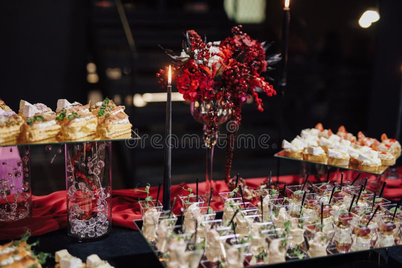 A Buffet at an Event with Red Decor Stock Photo - Image of catering ...