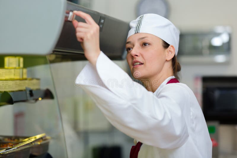 Buffet Female Worker Servicing Food in Cafeteria Stock Photo - Image of ...