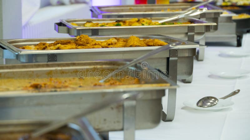 Buffet guests take food 4K stock image. Image of catering - 151613977