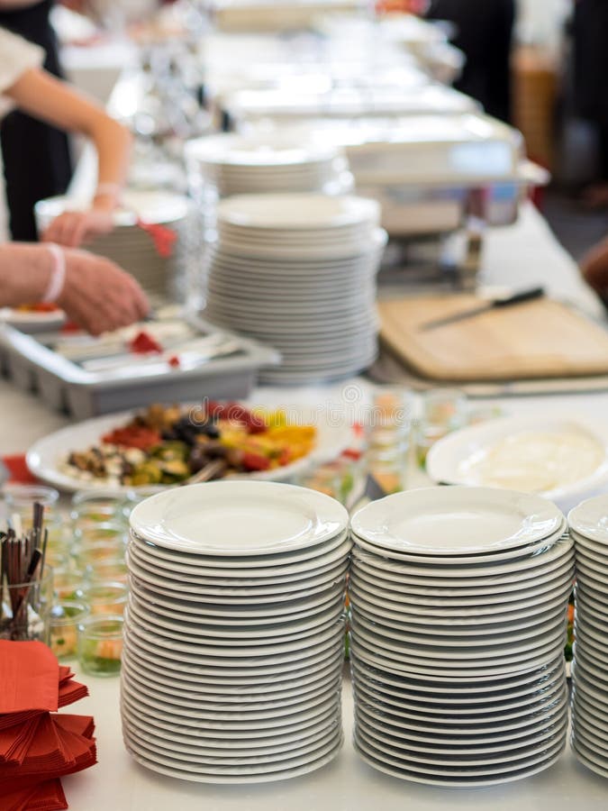 Buffet with Plates on a Big Celebration Stock Image - Image of plate ...