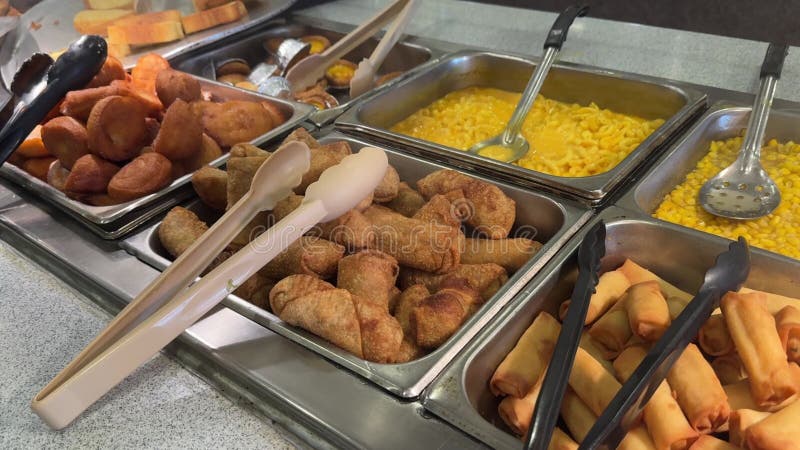 A Buffet Selection Featuring Fried Appetizers, Spring Rolls, Macaroni ...