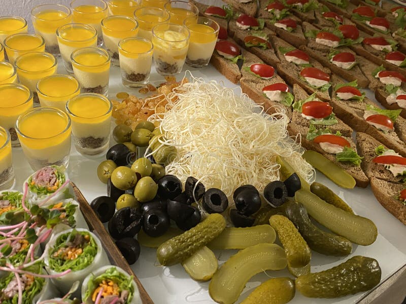 Buffet with Spring Rolls, Fresh Fruit, String Cheese, and Cakes ...