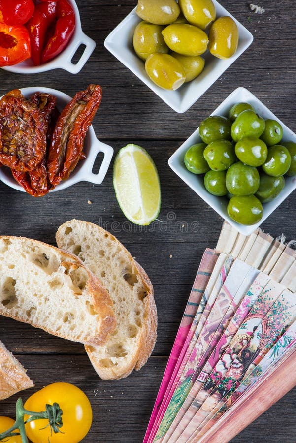 Buffet Style Authentic Spanish Tapas on Table with Fresh Herbs Stock ...