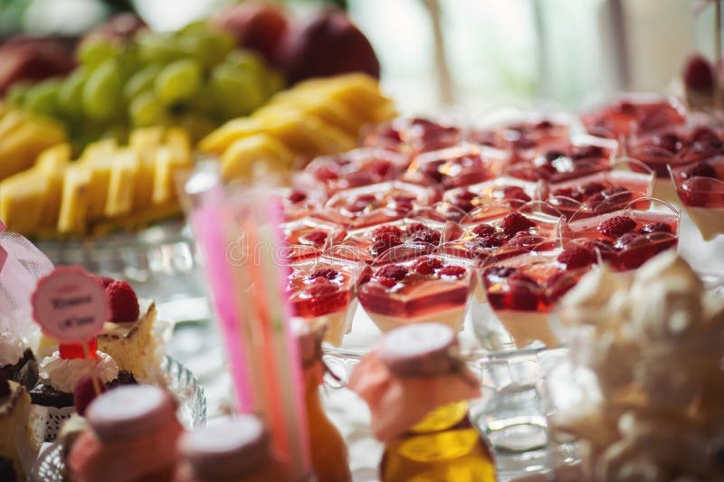 Buffet Table at the Celebration of the Wedding. Desserts with Fruits ...