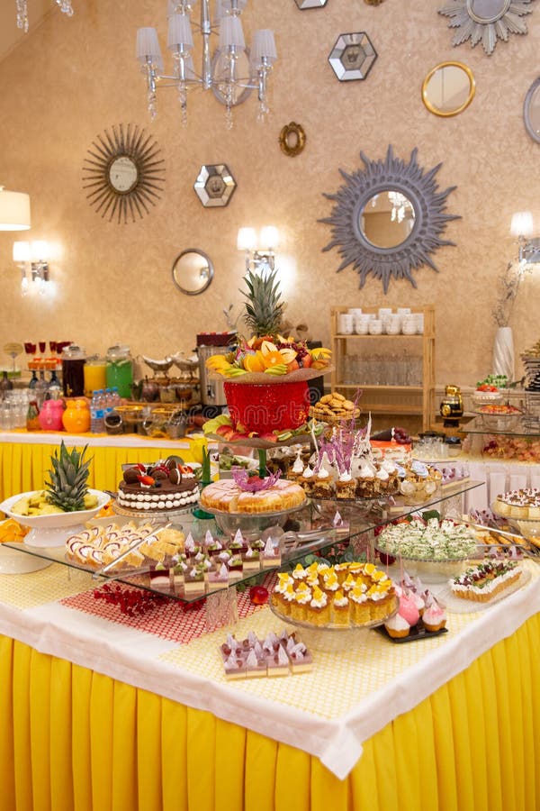 Buffet Table with Different Dishes in a Beautiful Restaurant Stock ...