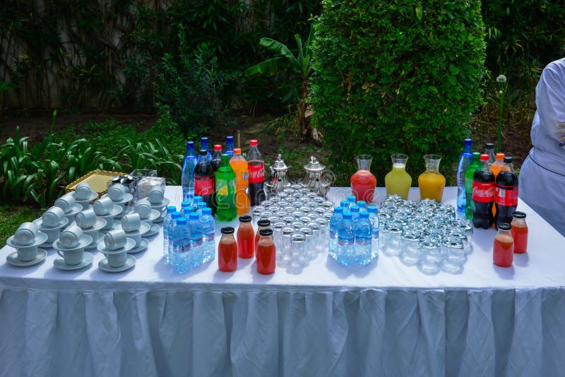 Buffet Table in the Garden. Soft Drinks and Empty Cups Stock Image ...
