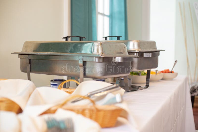 Buffet table with hot food stock photo. Image of plate - 140513680