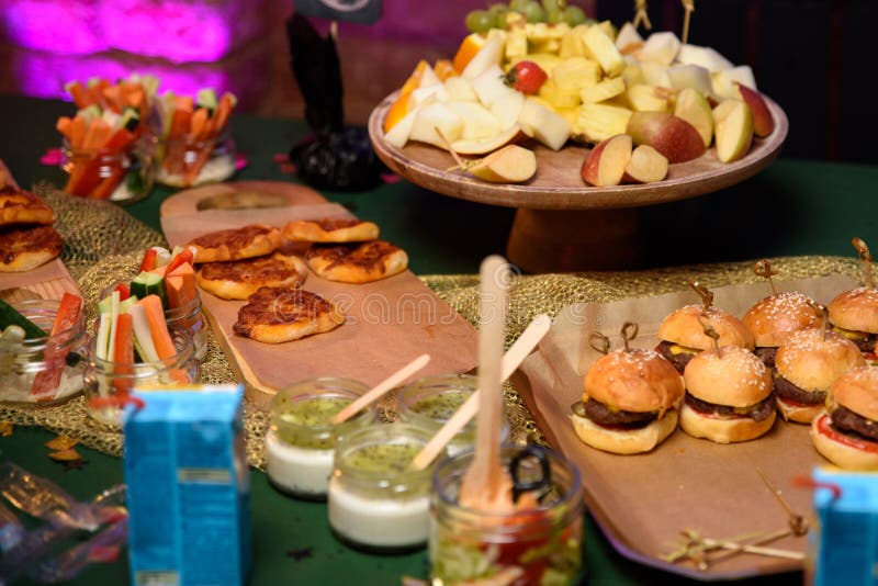 Buffet Table with Mini Burgers and Fruit Stock Photo - Image of event ...