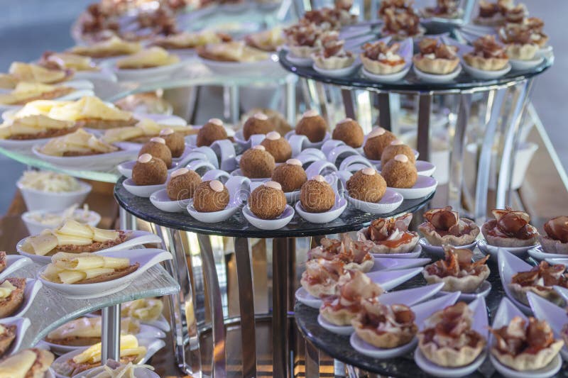 Buffet Table with the Plates of Desserts and Snacks Stock Image - Image ...