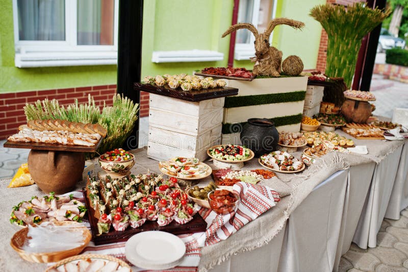 Buffet Table of Reception with Cold Snacks, Meat and Salads Stock Photo ...