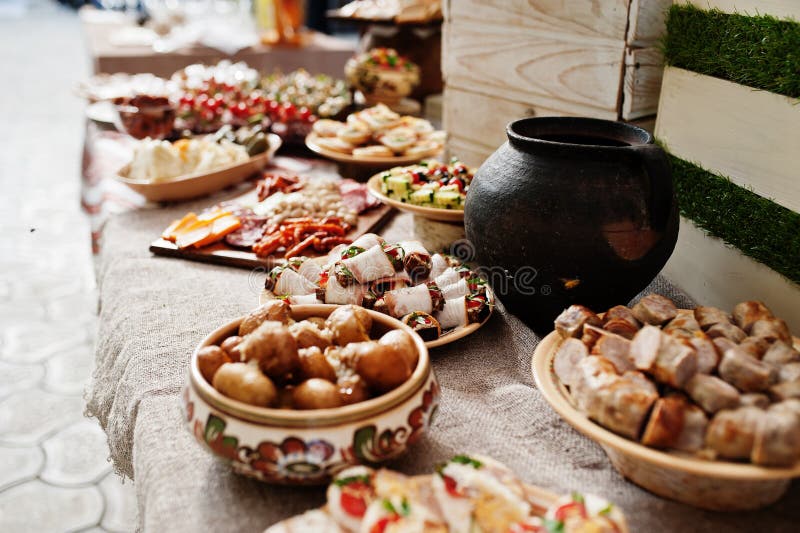 Buffet Table of Reception with Cold Snacks, Meat and Salads Stock Photo ...