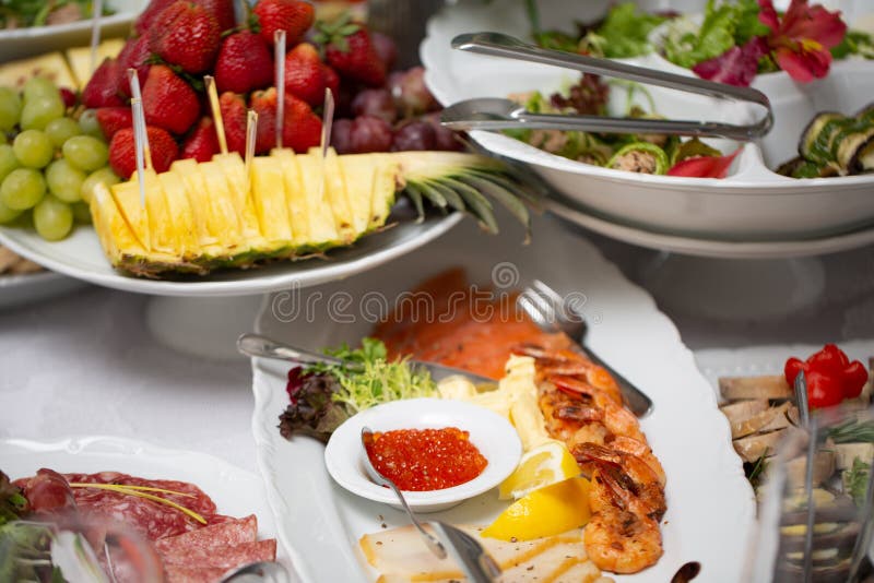 Buffet Table of Reception with Cold Snacks, Shrimp, Fish, Caviar Stock ...