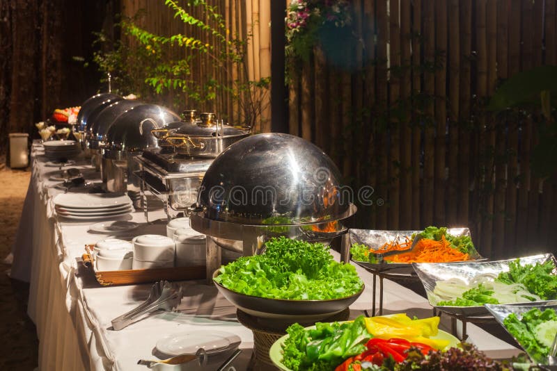 Buffet Table with Row of Food Service Steam Pans Stock Photo - Image of ...