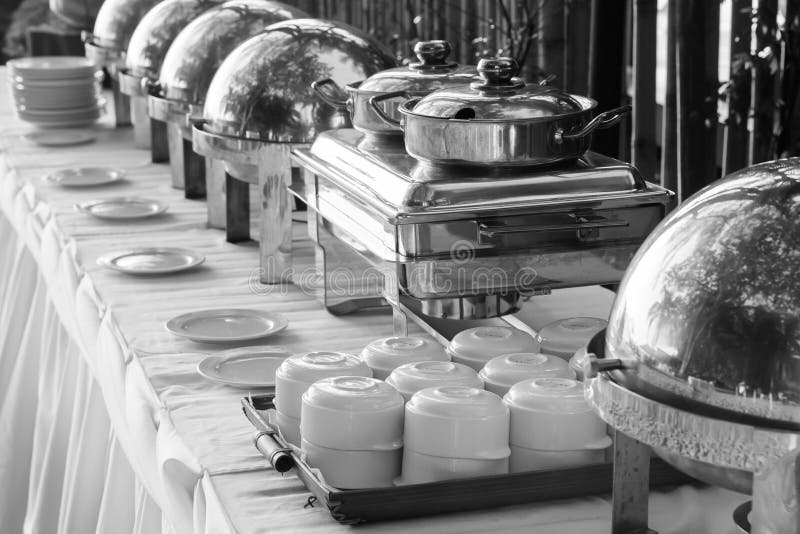 Buffet Table with Row of Food Service Steam Pans Stock Photo - Image of ...