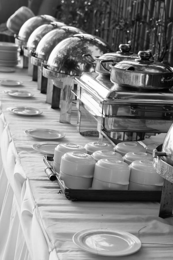 Buffet Table with Row of Food Service Steam Pans Stock Photo - Image of ...