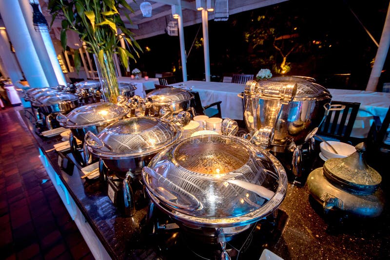 Buffet Table with Row of Food Service Steam Pans Stock Photo - Image of ...