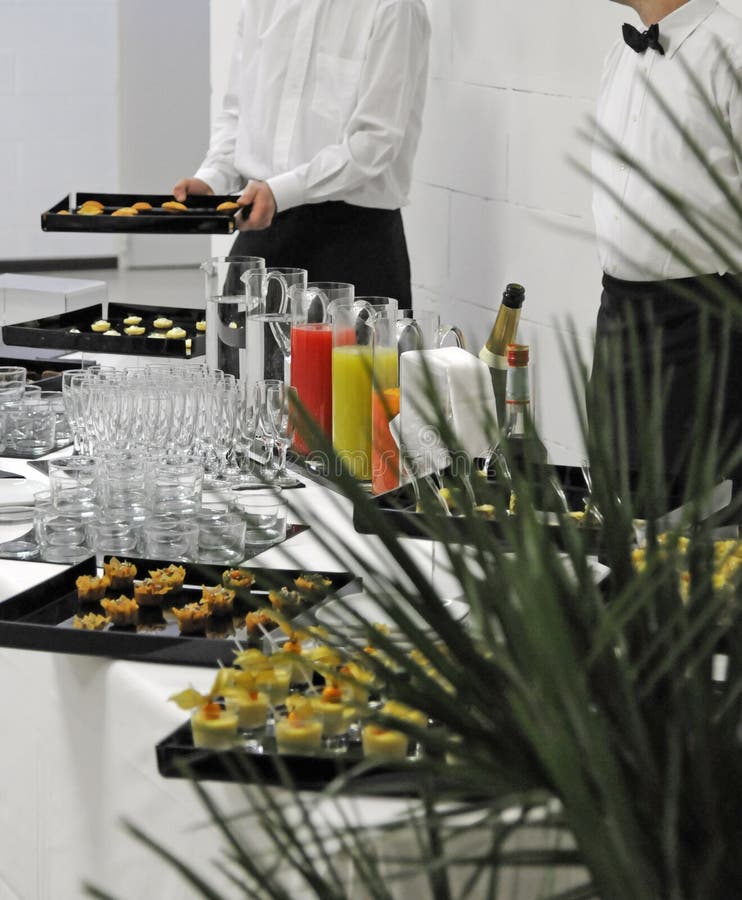 Buffet Table with Two Waiters Waiting for Guests To Arrive Stock Photo ...