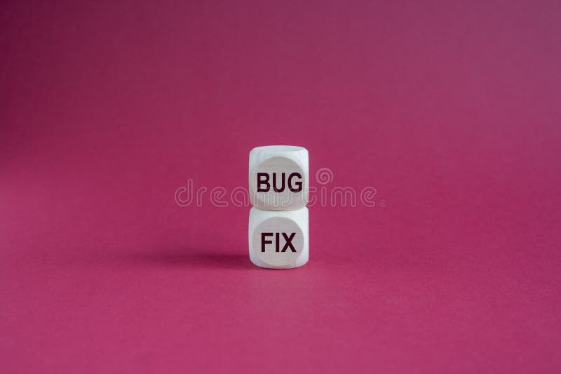 Bug Fix Message Written on Wooden Cubes with Pink Background ...