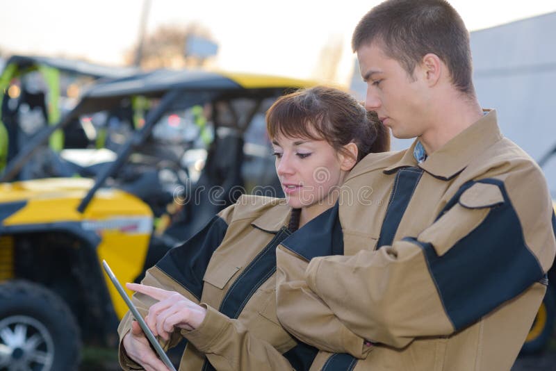 Buggy Drivers Consulting Notes Stock Image - Image of outfit, dune ...