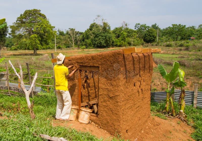 Mud house roof making stock photo. Image of mountain - 117276596