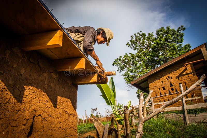 Mud house roof making stock image. Image of demolished - 117276735