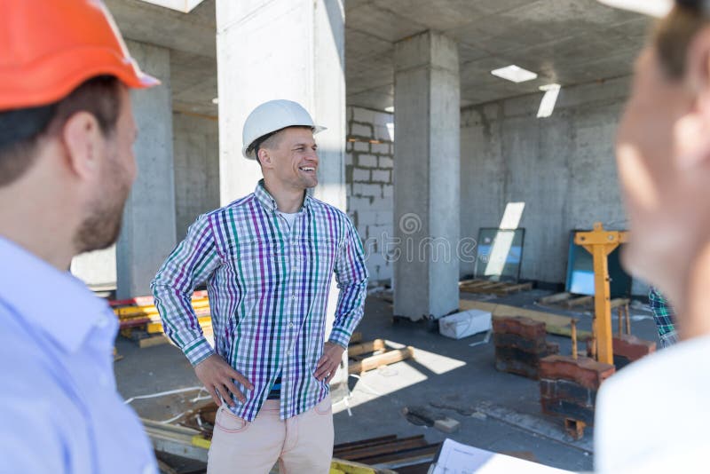 Buiders on Construction Site, People Building Business Concept ...