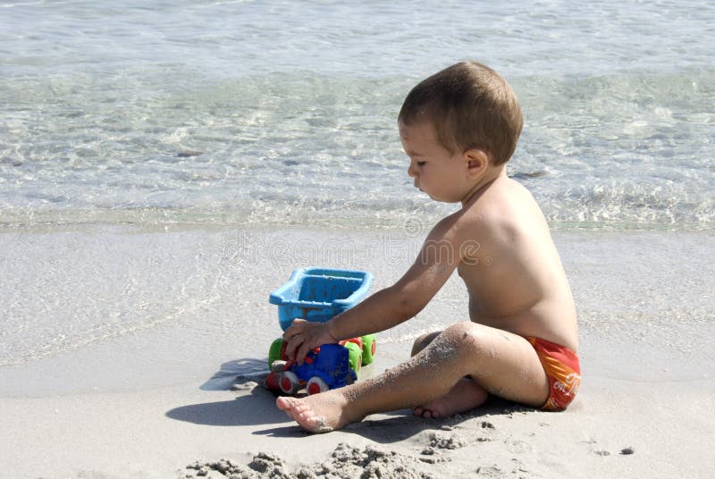 Build on the beach stock photo. Image of bucket, body - 6496120