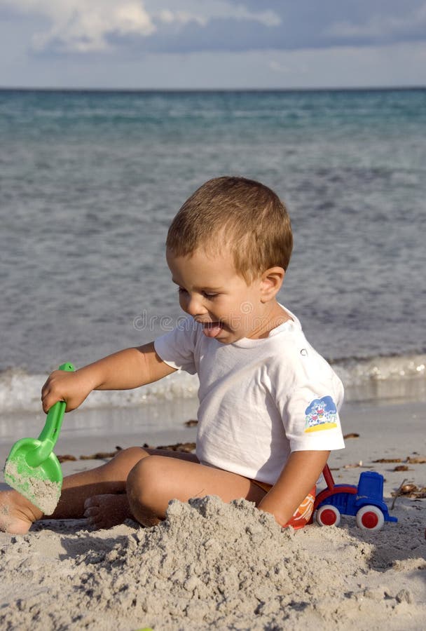 Build on the beach stock photo. Image of childhood, cute - 6677536