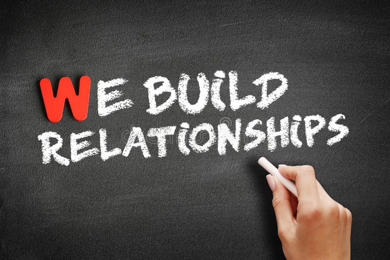We Build Relationships Text on Blackboard Stock Photo - Image of ...