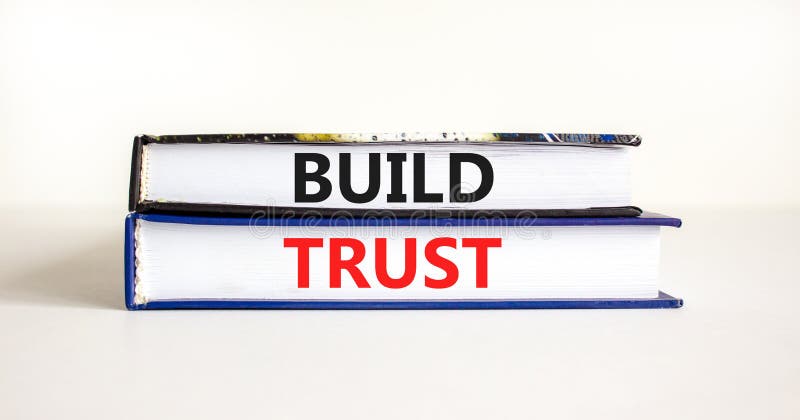 Build Trust Symbol. Concept Words Build Trust on Books on a Beautiful ... Build Trust Symbol. Concept Words Build Trust on Books on a Beautiful ...