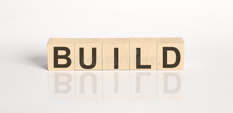 BUILD Word from Wooden Blocks on the White Desk Stock Photo - Image of ...