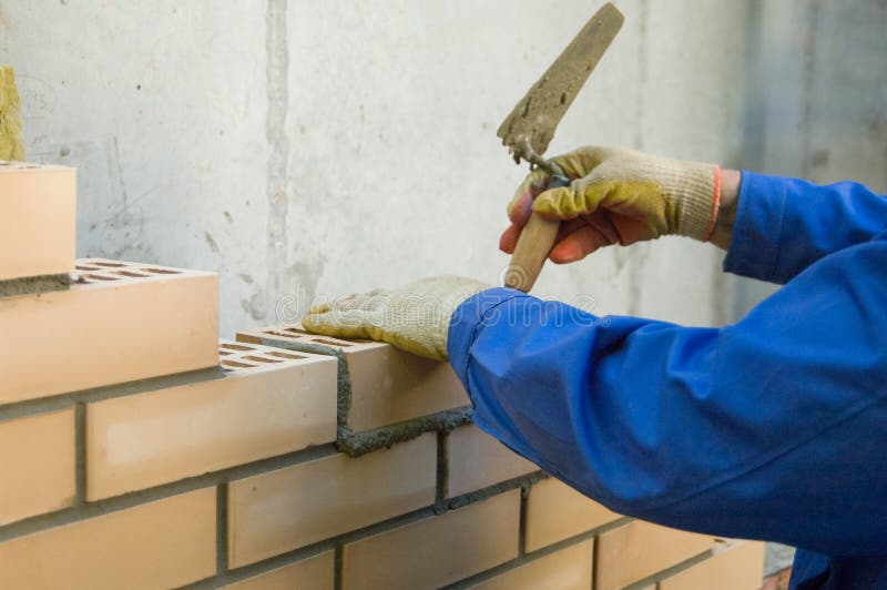 Builder stock photo. Image of modern, trade, wall, brick - 6892338