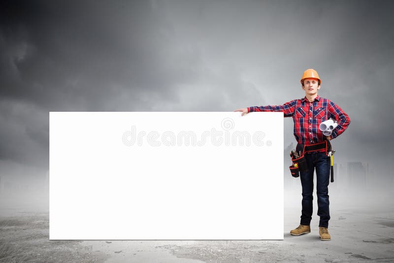 Builder with banner stock photo. Image of male, construction - 45856224