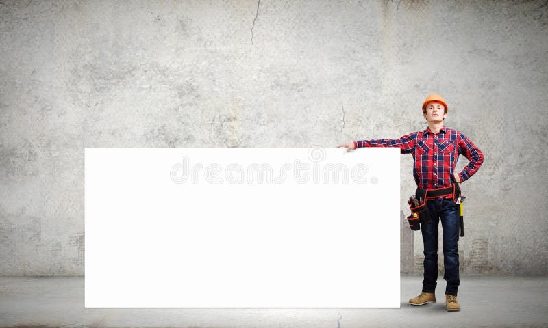 Builder with banner stock photo. Image of male, construction - 45856224