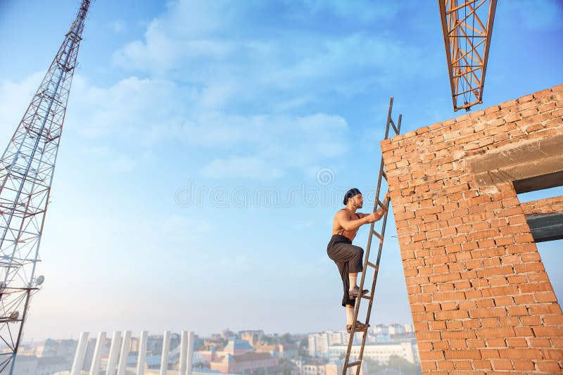 Builder with Bare Climb on Ladder Up. Stock Photo - Image of contractor ...