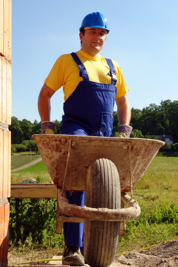 Builder with barrow stock photo. Image of site, barrow - 5589614