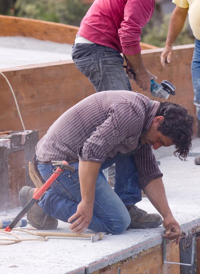 Builders at work stock image. Image of house, brick, builders - 35691673