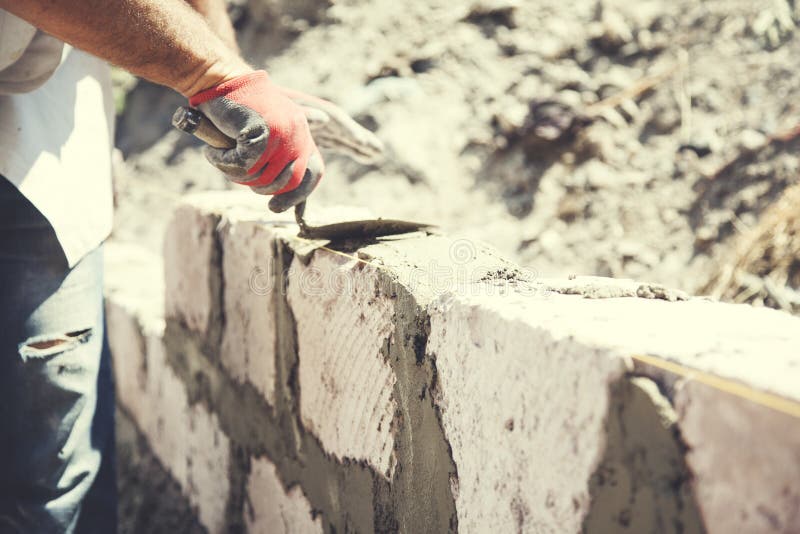 The Builder is Building a Wall Stock Image - Image of industry, brick ...
