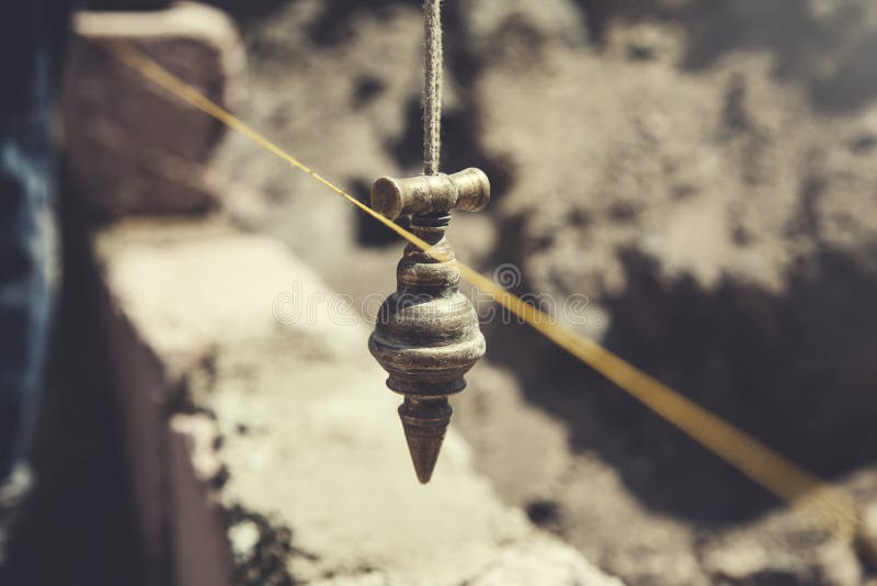 The Builder is Building a Wall Stock Photo - Image of bricks, helmet ...