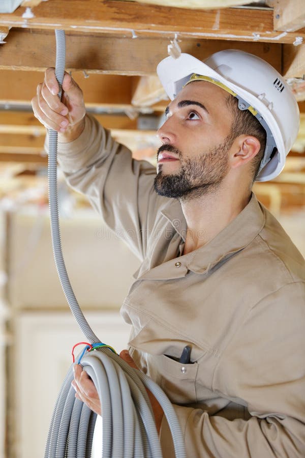 Builder with Cables on Ceiling Stock Image - Image of power, fibre ...