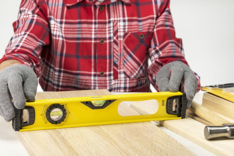 Builder or Carpenter Working with Spirit Level. Stock Image - Image of ...
