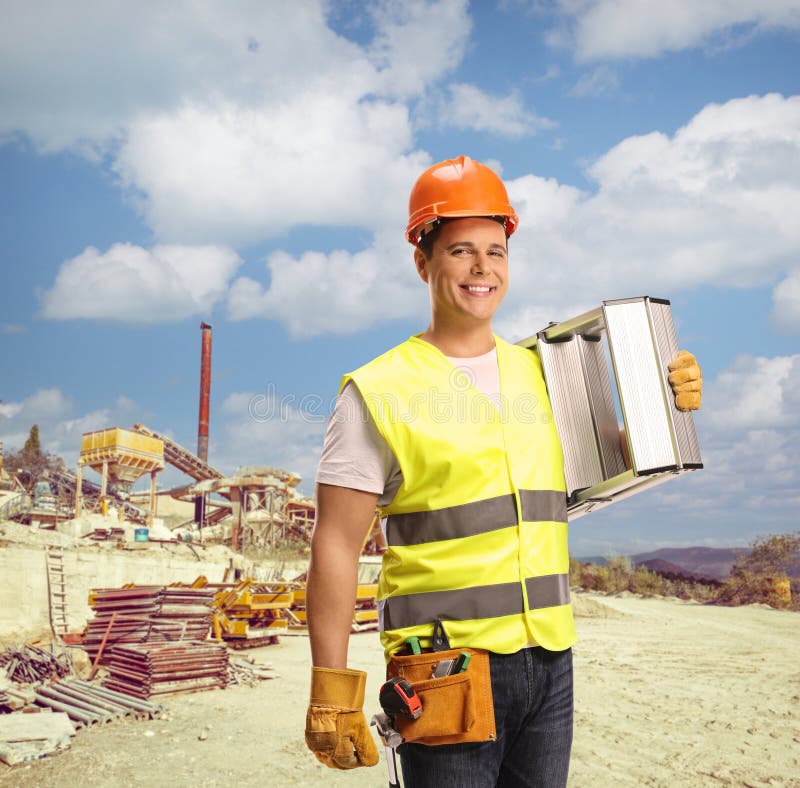 Builder carrying a ladder stock photo. Image of adult - 354194108