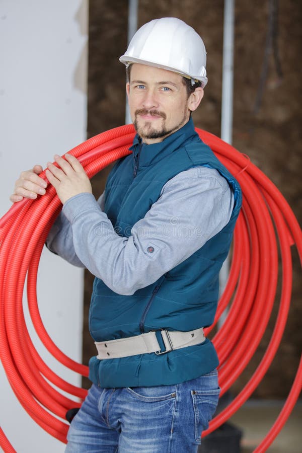 171 Man Carrying Pipe Stock Photos - Free & Royalty-Free Stock Photos ...