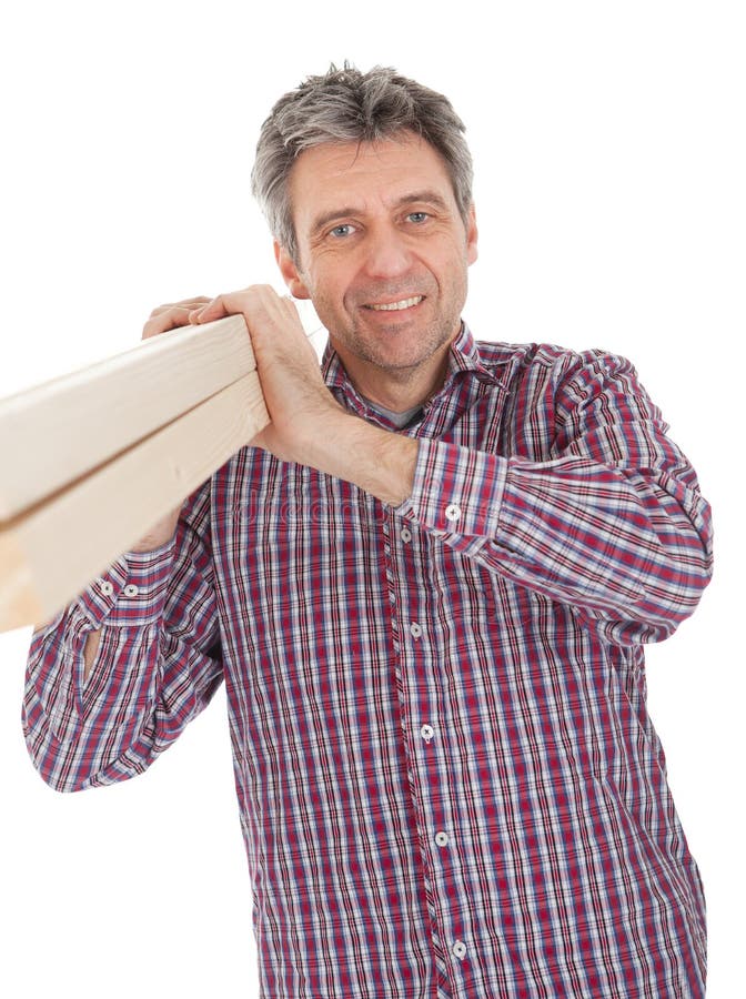 Builder carrying timber stock image. Image of carpenter - 23926889