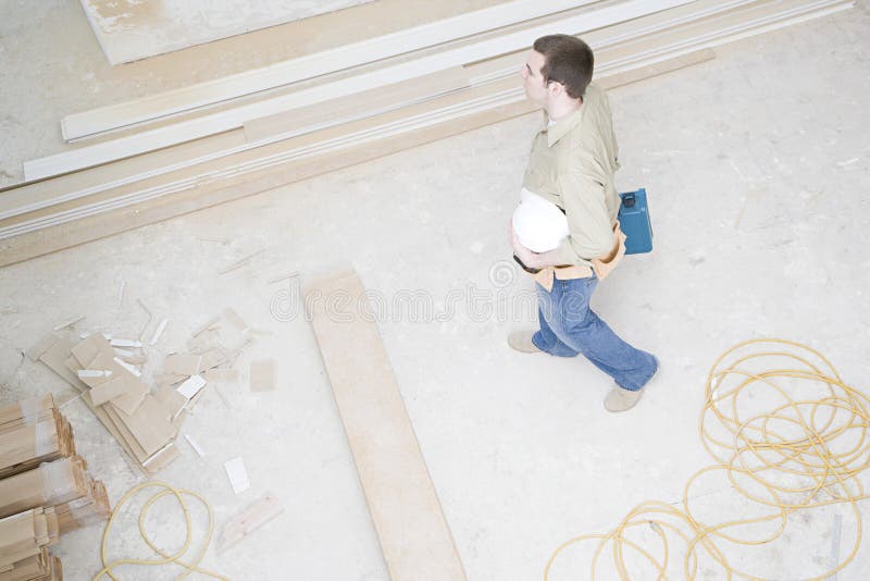Builder carrying timber stock image. Image of carpenter - 23926889