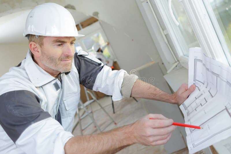 Builder Checking Building Plans Stock Photo - Image of manager, expert ...