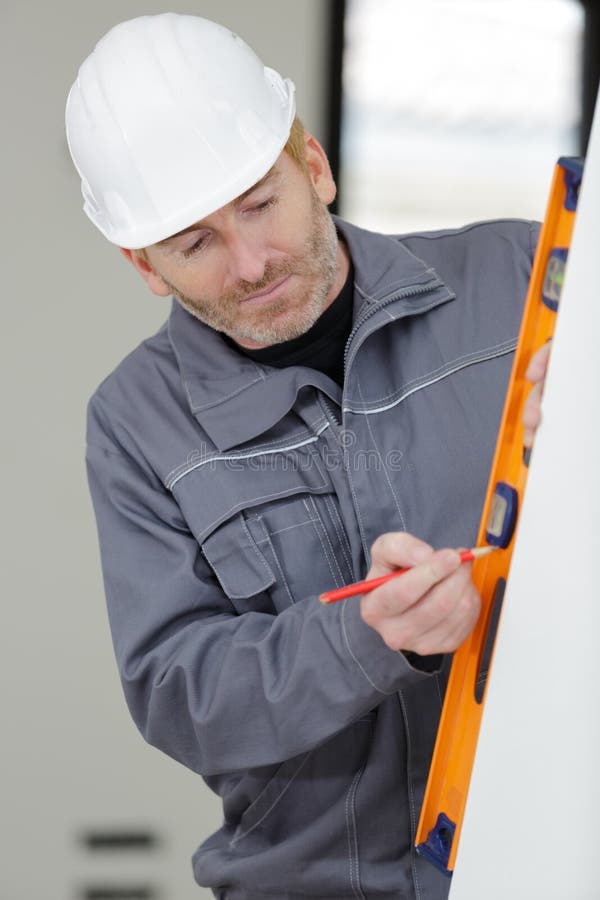 Builder Checking Level Wall Stock Image - Image of improvement, handsaw ...
